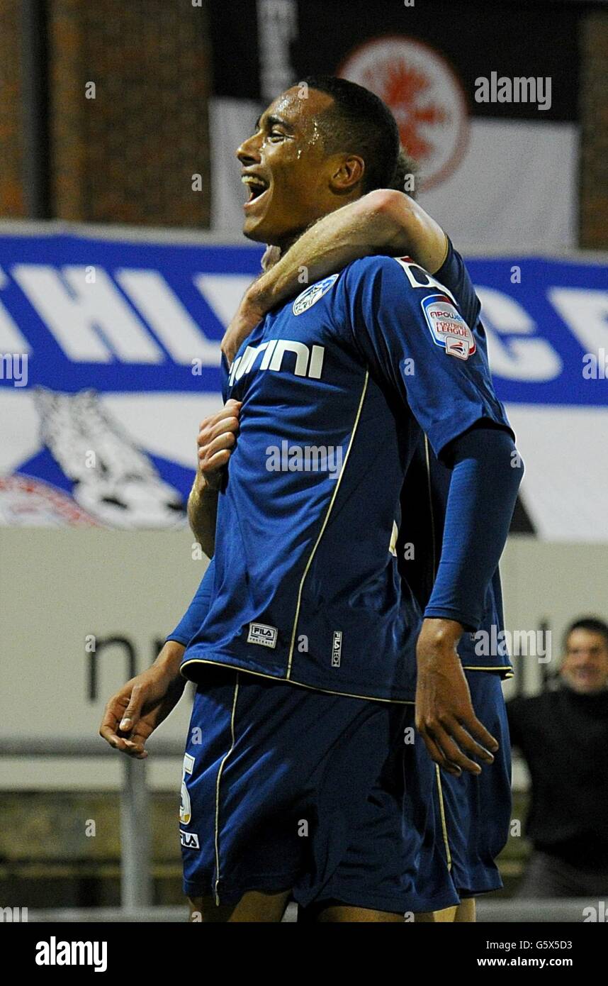 Oldham Athletic's Jordan Obita (front) celebrates scoring his teams ...