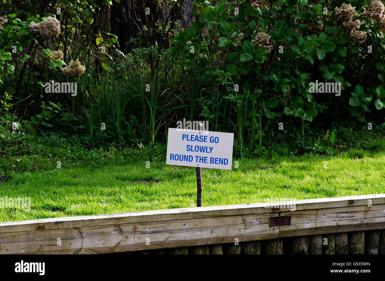 Sign reading "Please go slowly round the bend" (take that any way you ...