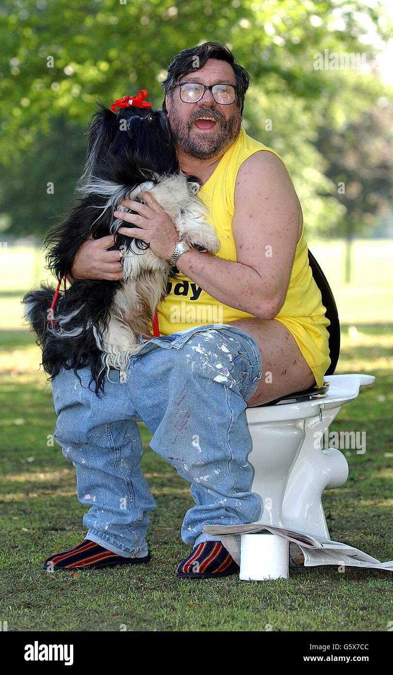 Actor Ricky Tomlinson poses on a toilet with 'Axel' during a photocall ...