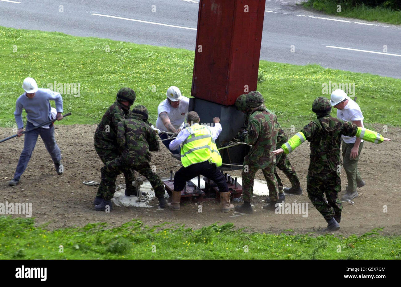 Workman moving the 50 ft memorial cross to the late Cardinal Basil Hume ...