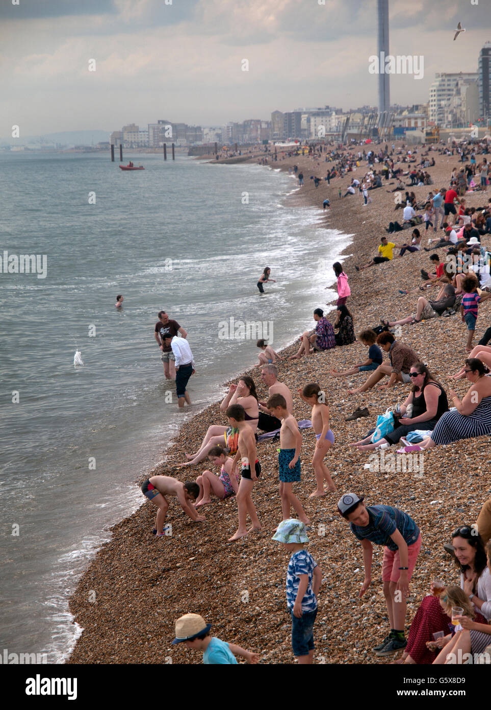 A busy day on the beach in Brighton Stock Photo - Alamy