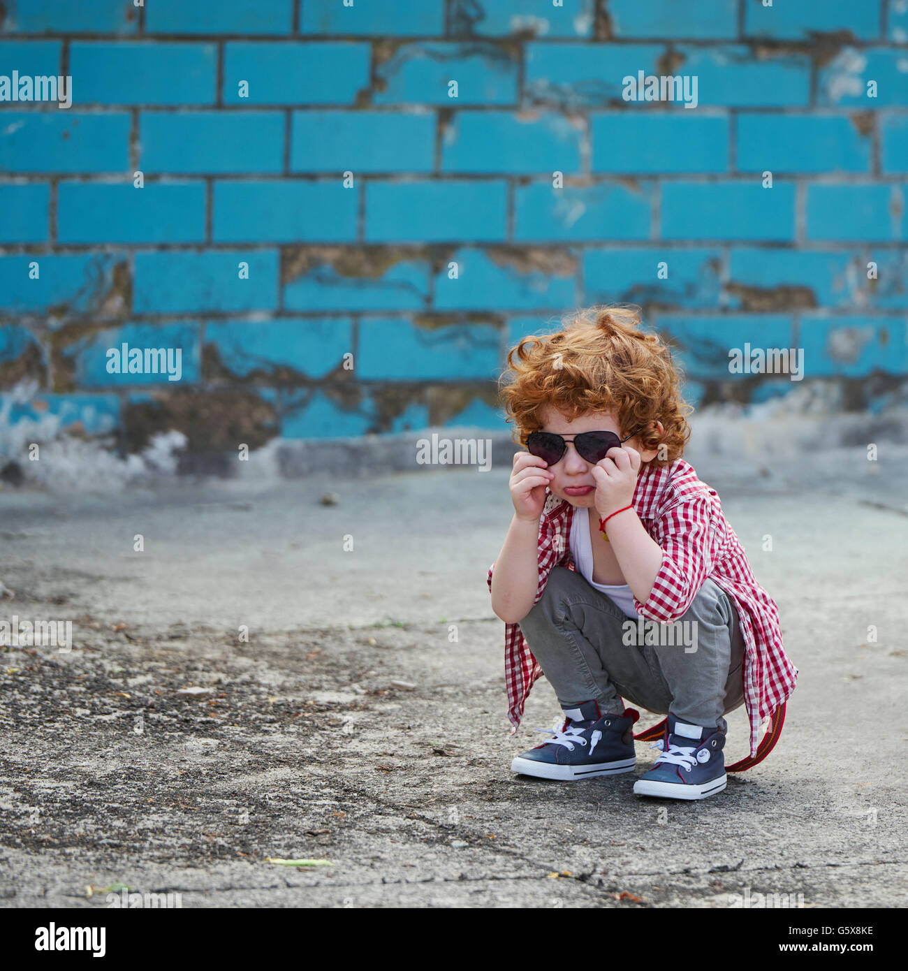 photo of little cute unhappy boy Stock Photo - Alamy