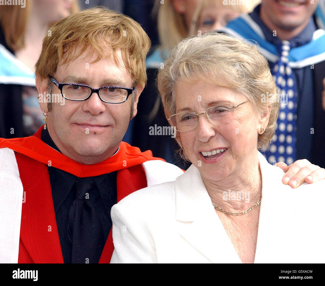 Sir Elton John with his mother, smiles after receiving an Honorary ...