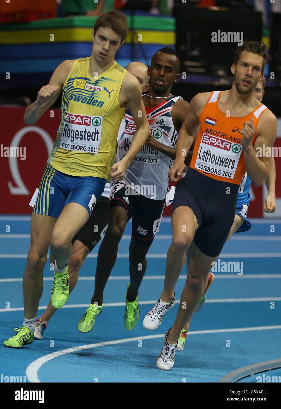 Great Britain's Mukhtar Mohammed (centre) competes in round one of the ...
