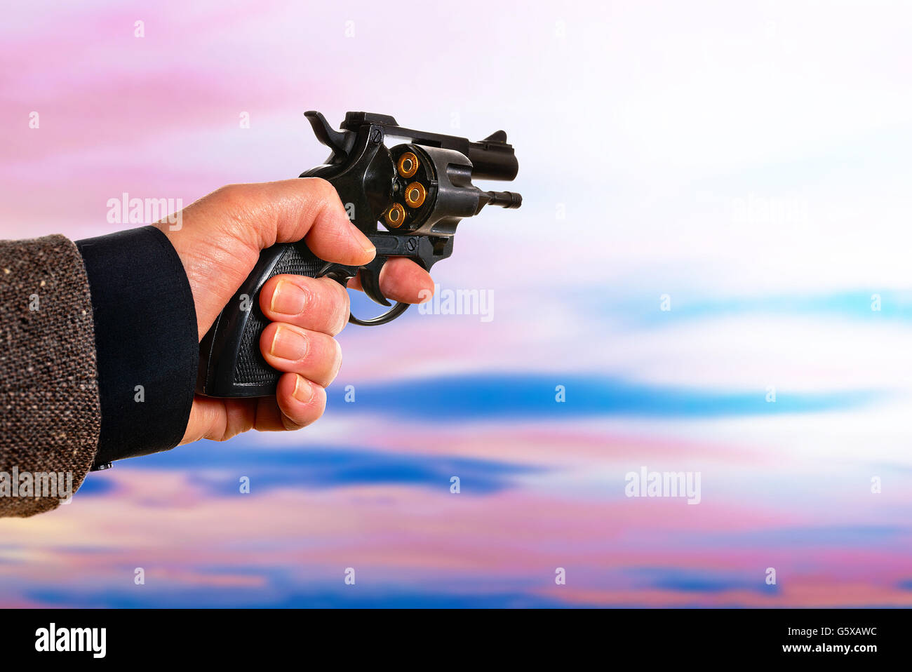 Sunset silhouette man gun hi-res stock photography and images - Alamy