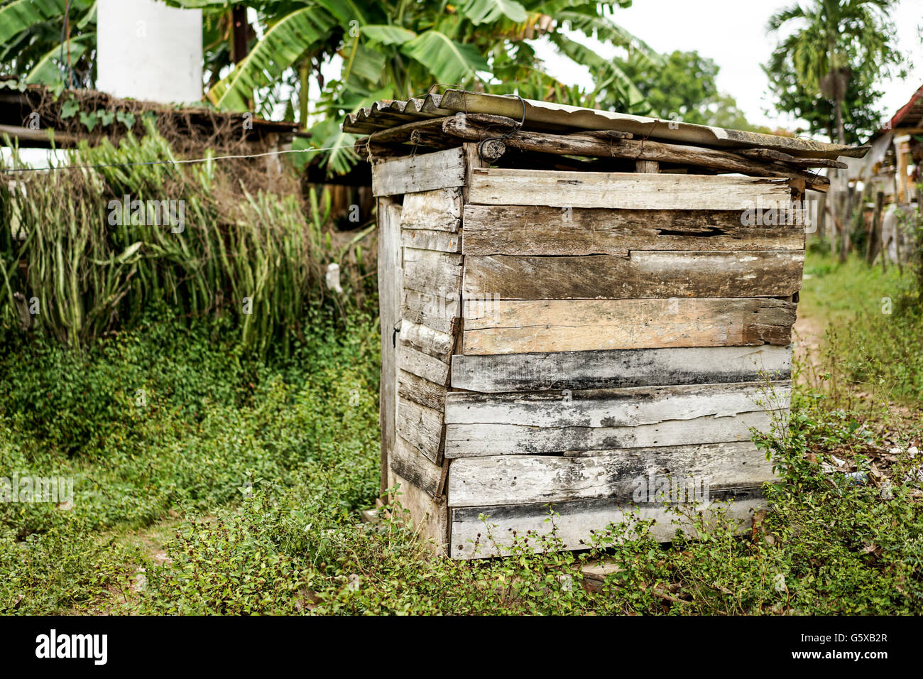 Miserable shack, house. Worn and dilapidated wooden shed. poor housing ...