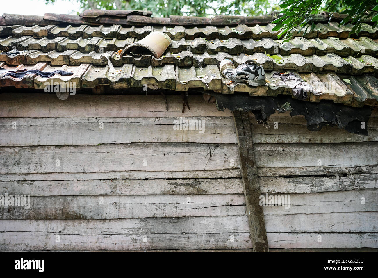 Miserable shack, house. Worn and dilapidated wooden shed. poor housing ...