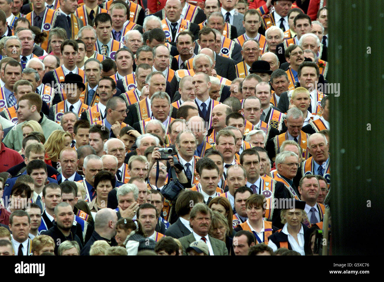 Portadown Orangemen are stopped by police at a metal barrier at ...