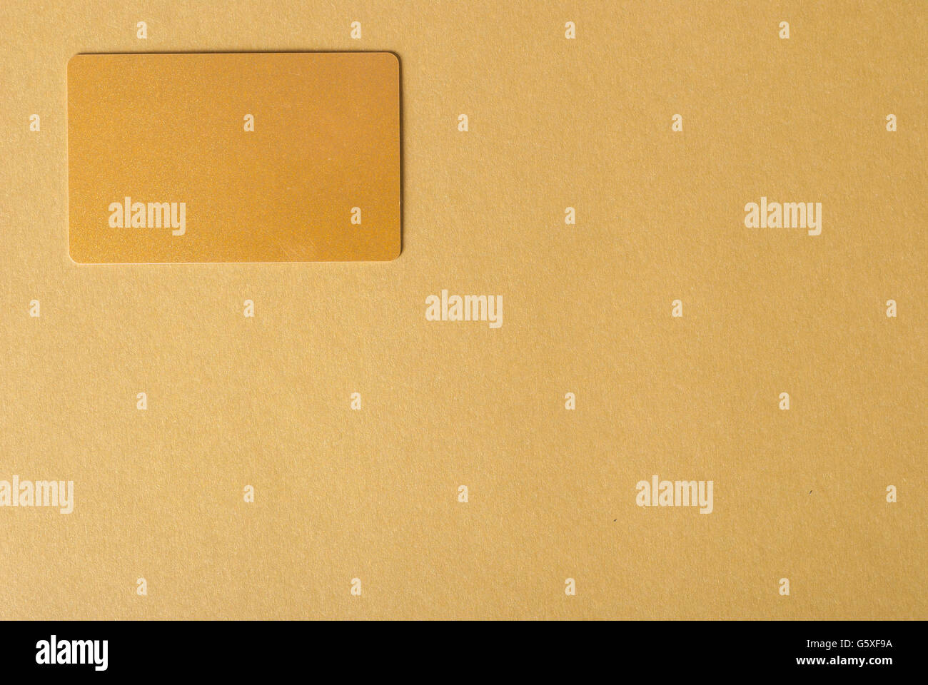 Brown card on desk Stock Photo - Alamy