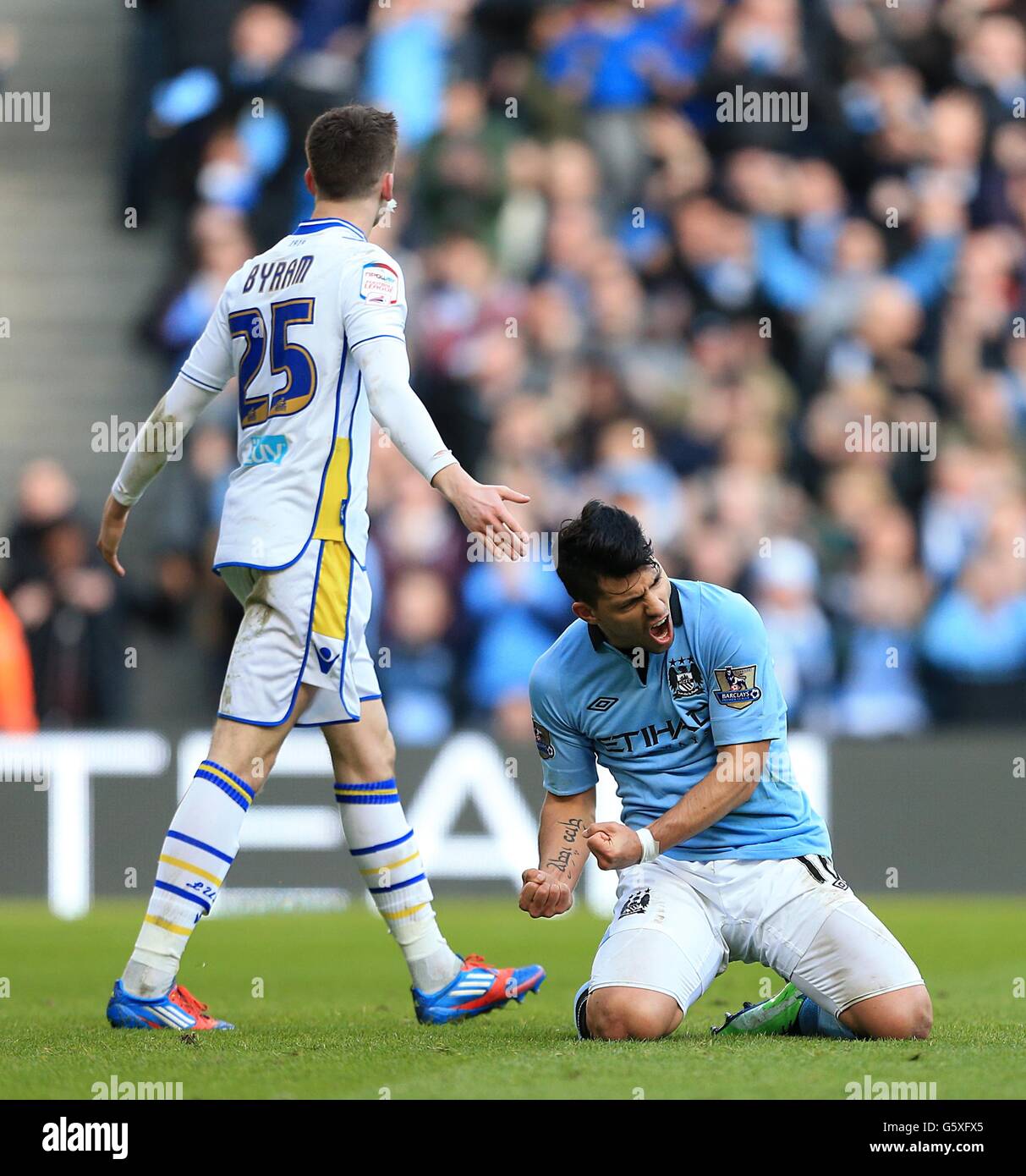 Manchester Citys Sergio Aguero Right Celebrates After Scoring His