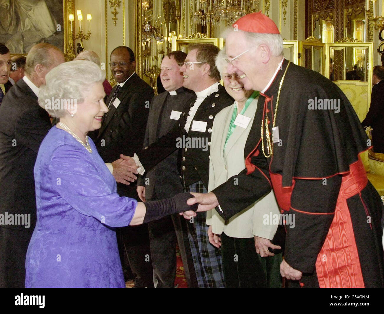 Queen Elizabeth II shakes hands with his eminence Cardinal Cormac ...