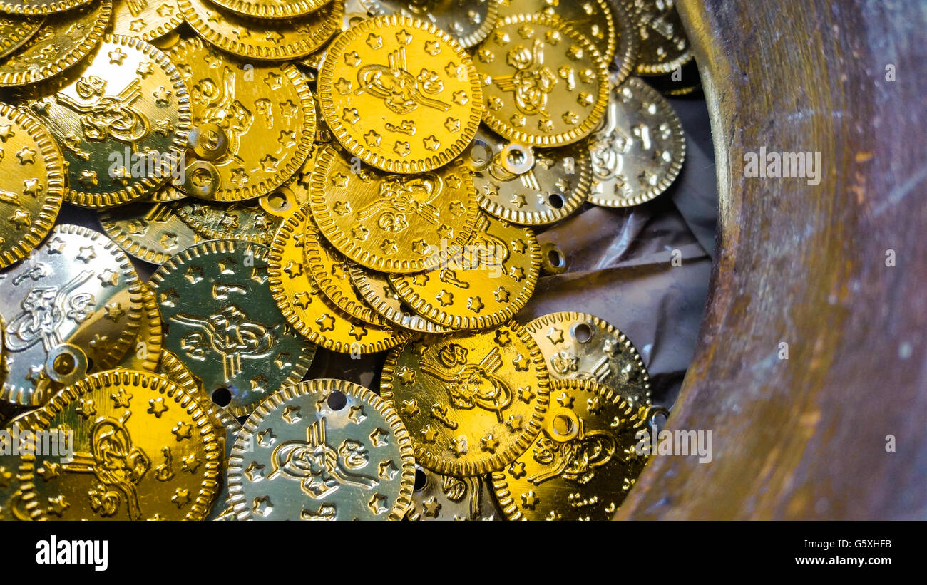 Fake gold and silver coins closeup Stock Photo - Alamy