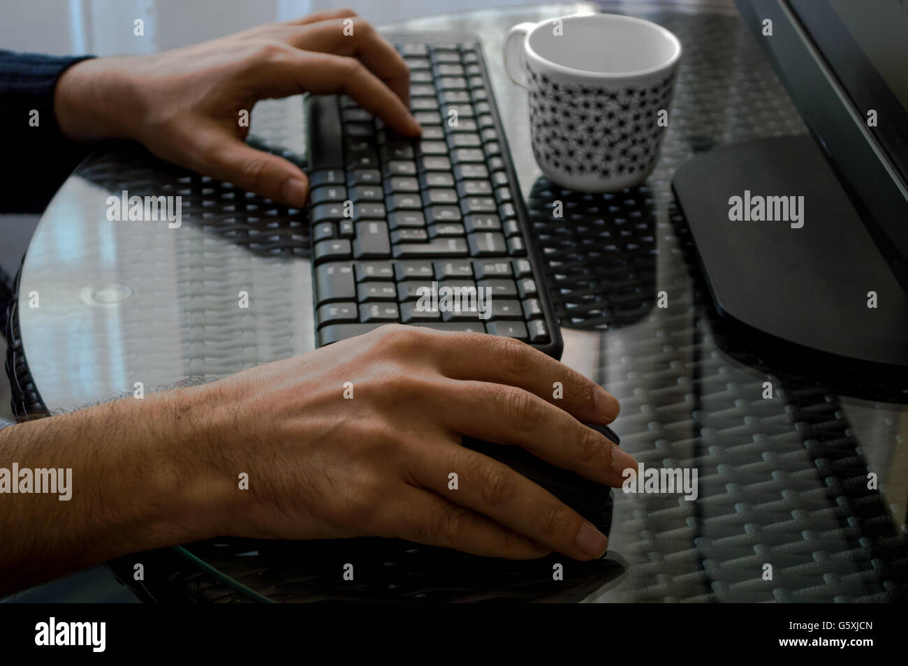 Mans hands holding typing on hi-res stock photography and images - Alamy