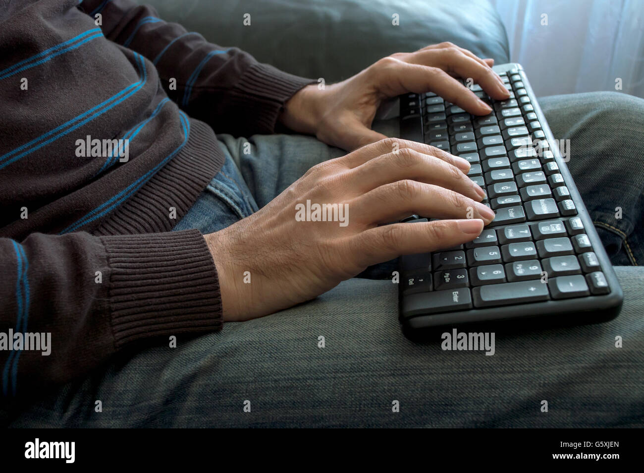 Man's hands on keyboard Stock Photo - Alamy