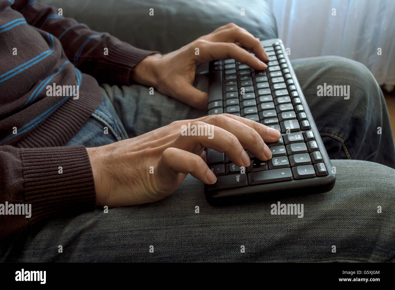 Man's hands on keyboard Stock Photo - Alamy