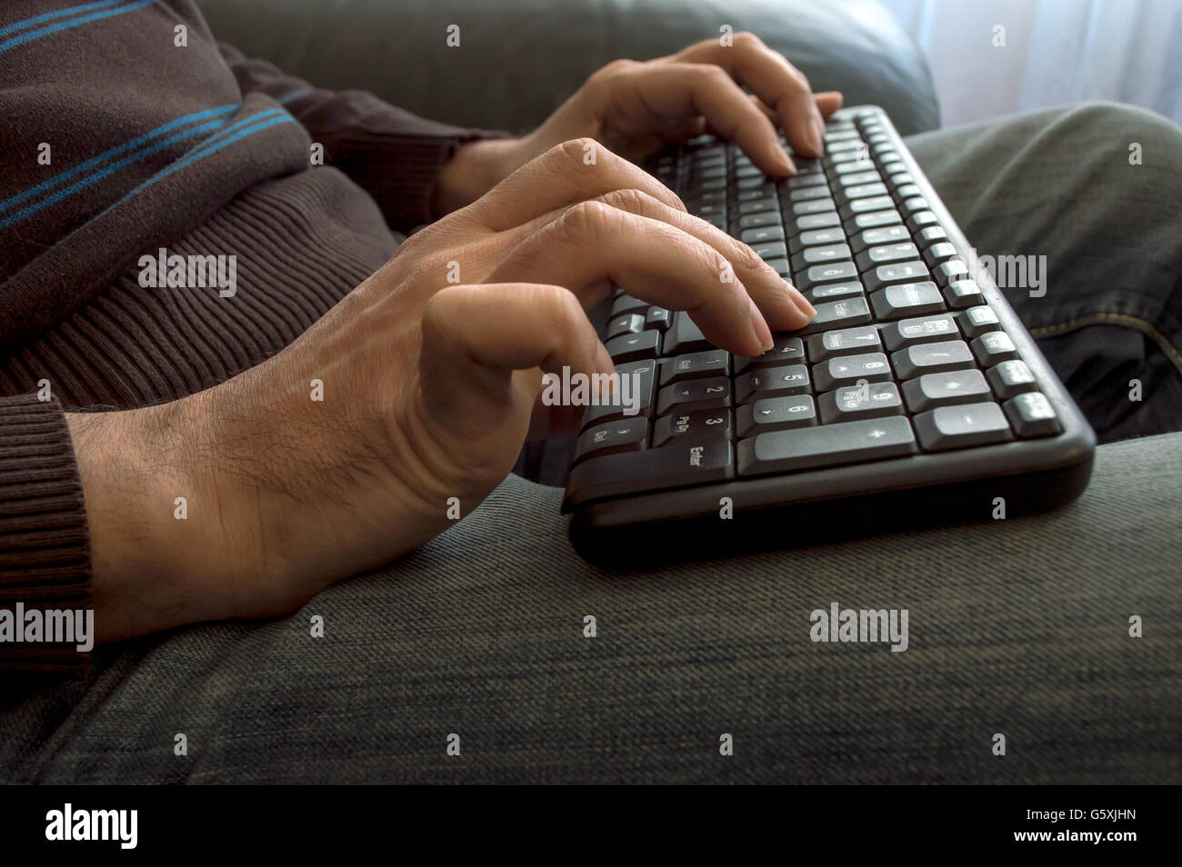 Man's hands on keyboard Stock Photo - Alamy