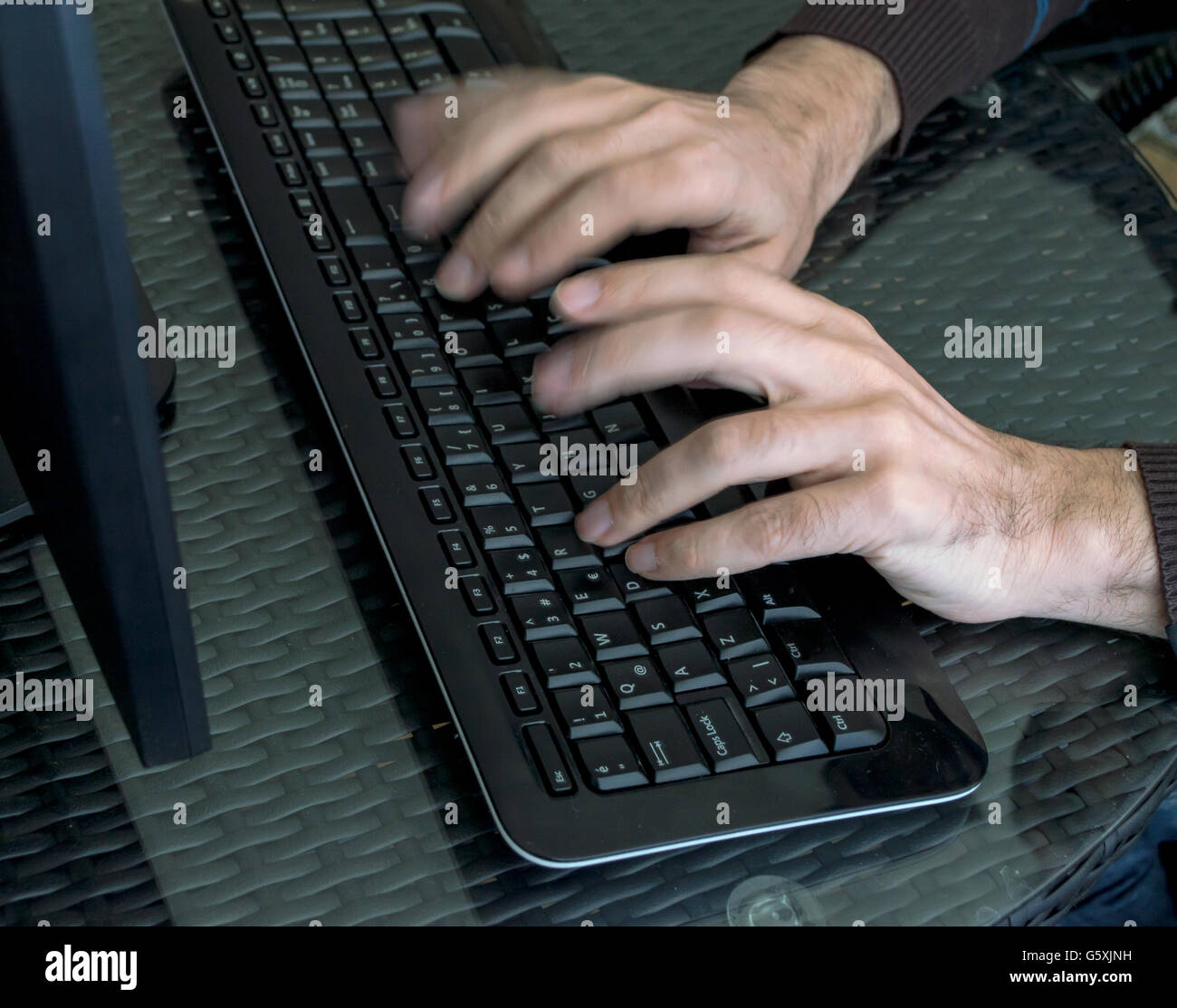 Man's hands on keyboard Stock Photo - Alamy