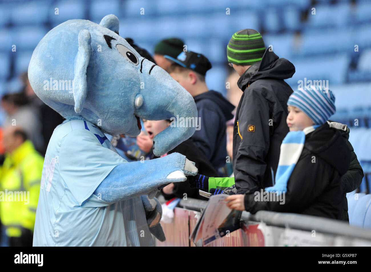 Coventry City mascot Sky Blue Sam greets fans before the game Stock ...