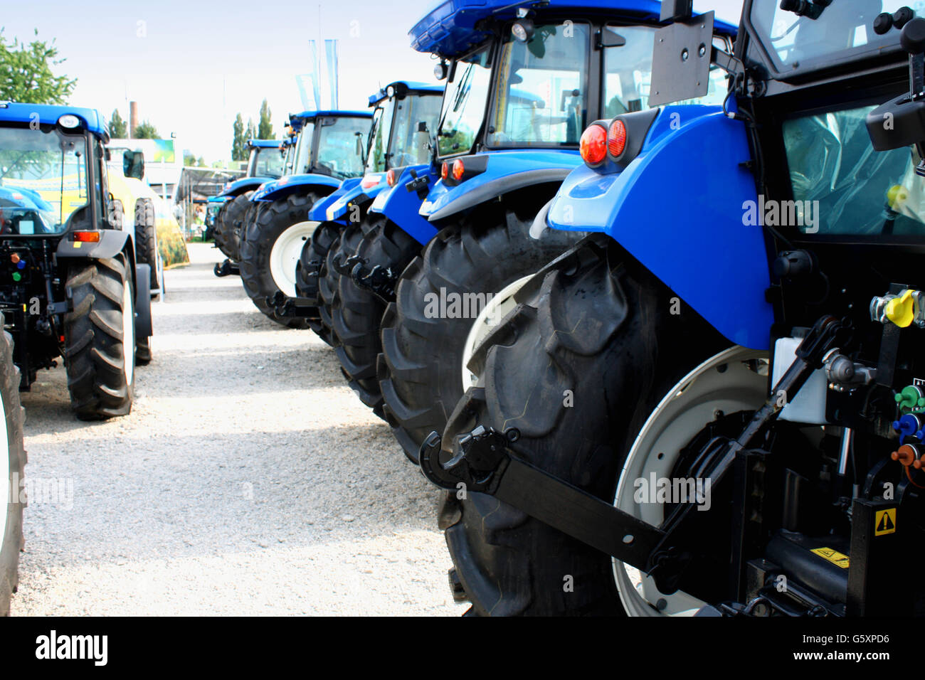 Close up of tractors in the line Stock Photo - Alamy