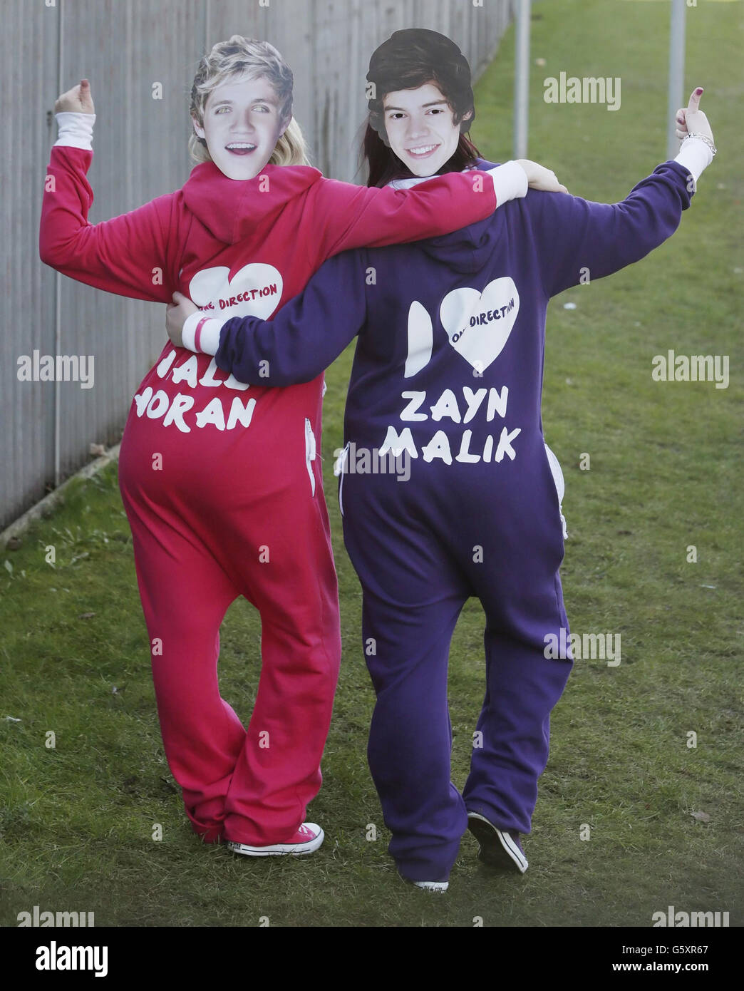 One Direction fans wearing face masks of group members at the Scottish ...