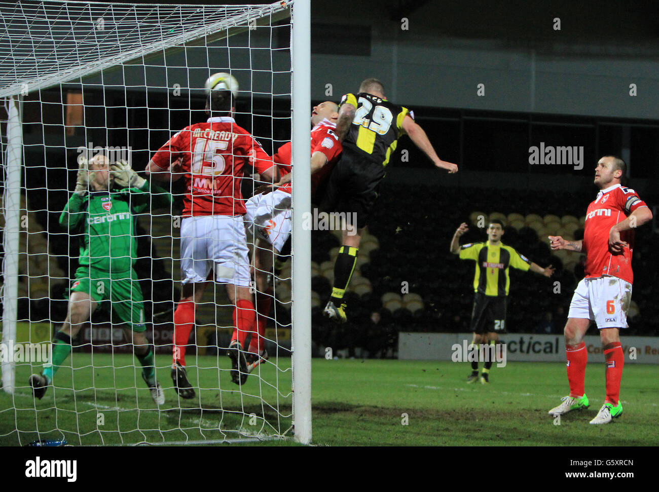 Burton Albion's Billy Kee (centre) scores his sides second goal of the ...