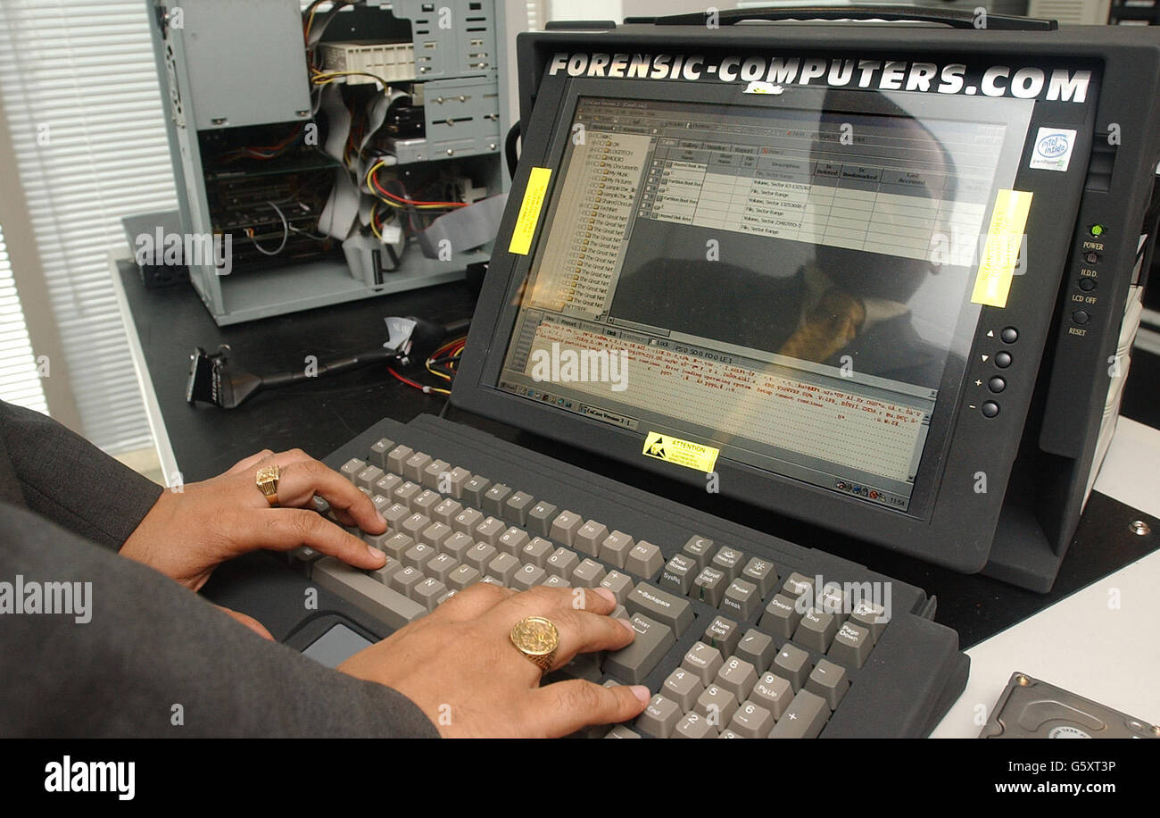 Police seize paedophile computers Stock Photo - Alamy