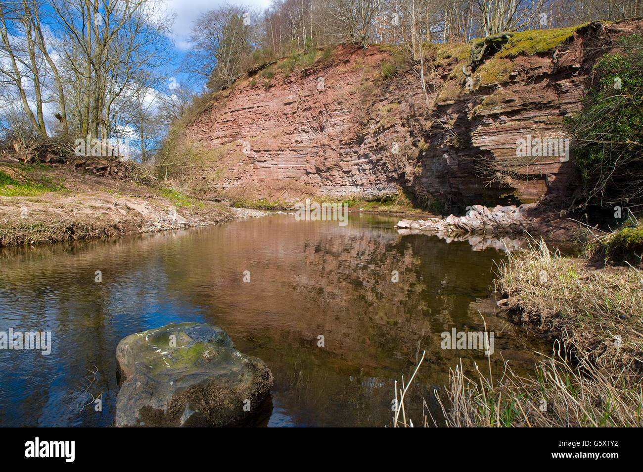 Red sandstone cliff on river Jed Water, Jedburgh, Scottish Borders ...