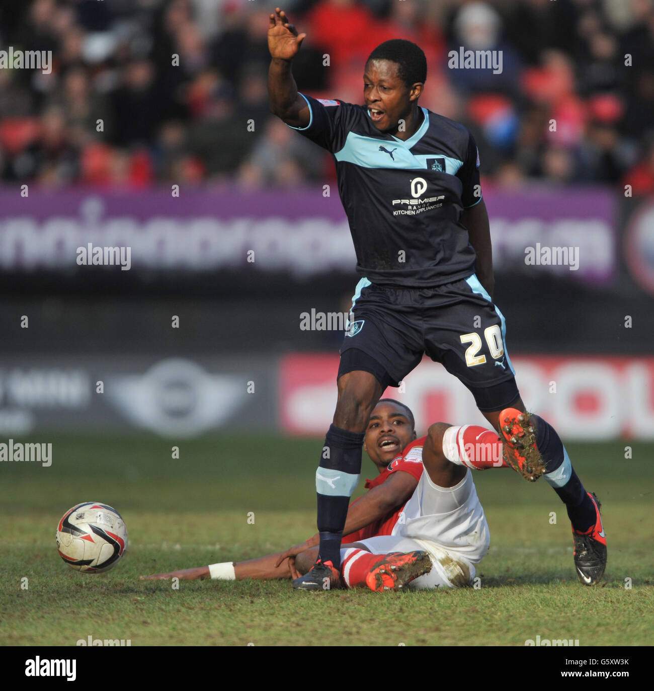 Charlton Athletic's Jonathan Obika (on floor) tackles Burnley's Marvin ...