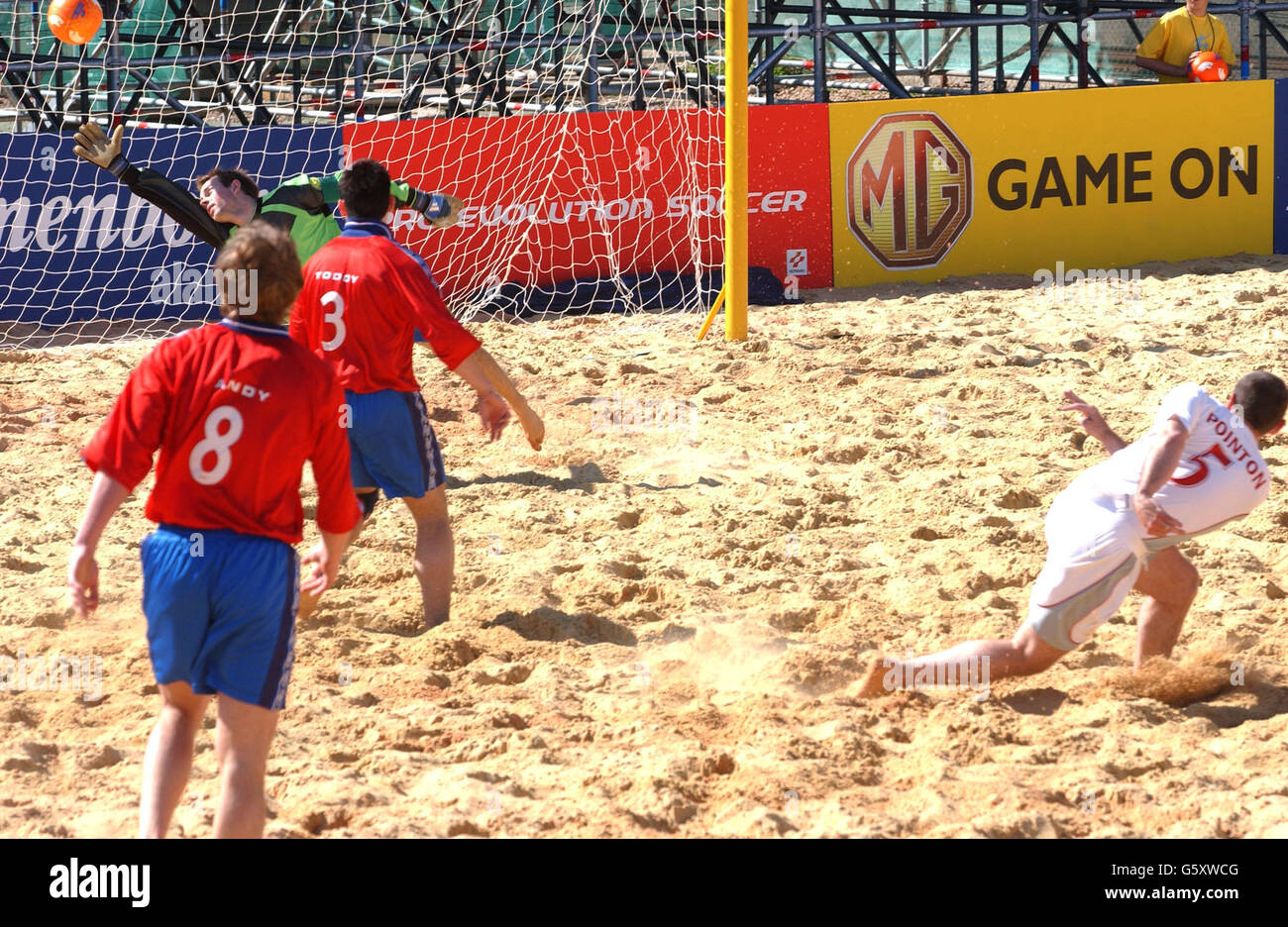 England captain Neil Pointon (right) shoots in his team's game against ...