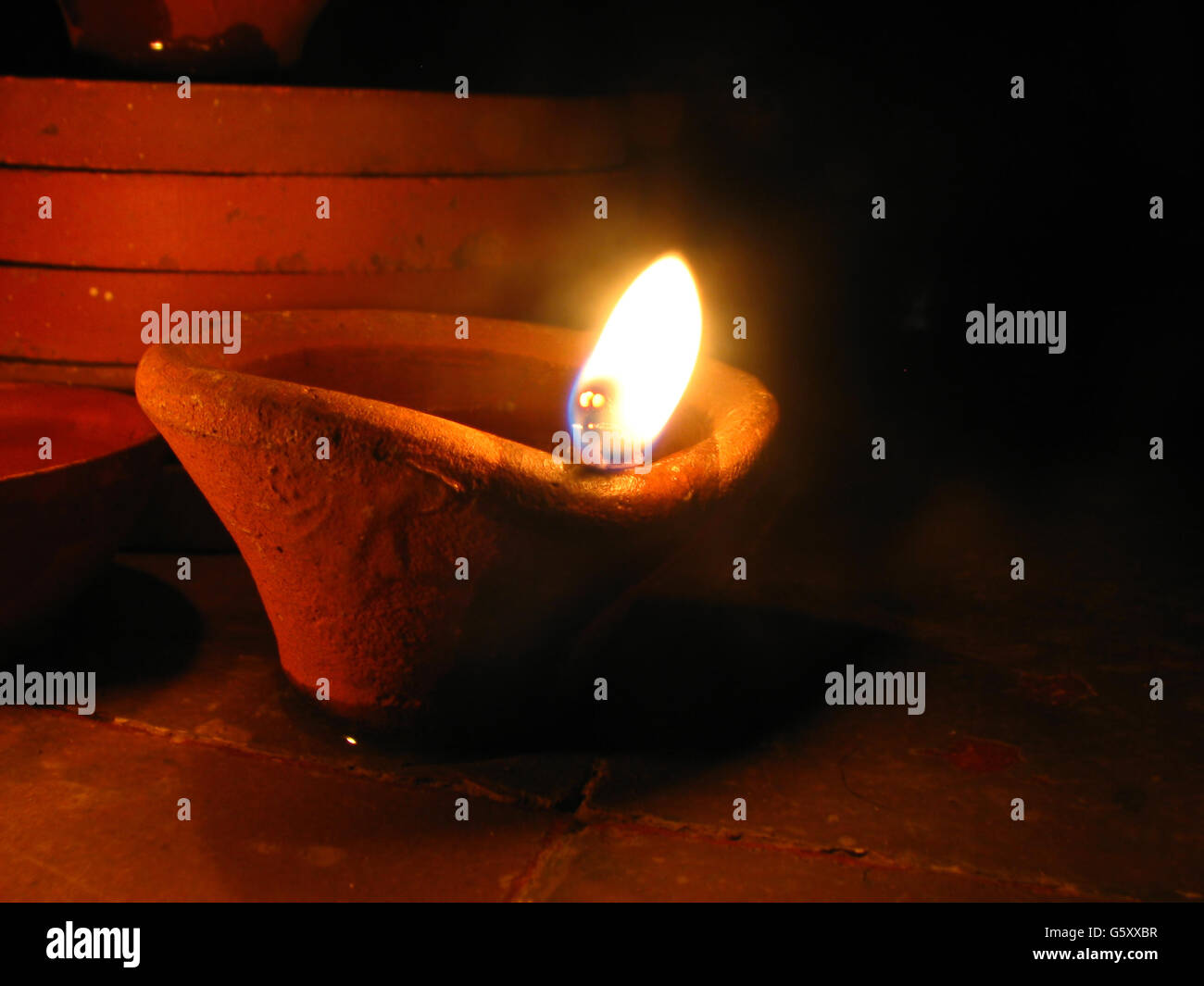 A holy lamp lit on the occassion of a Hindu festival in India Stock ...