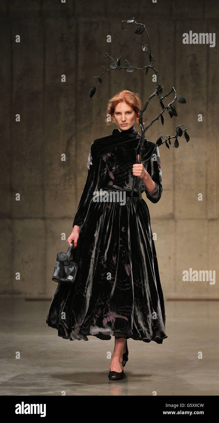 Models on the catwalk wear the Claire Barrow Autumn/Winter 2013 ...