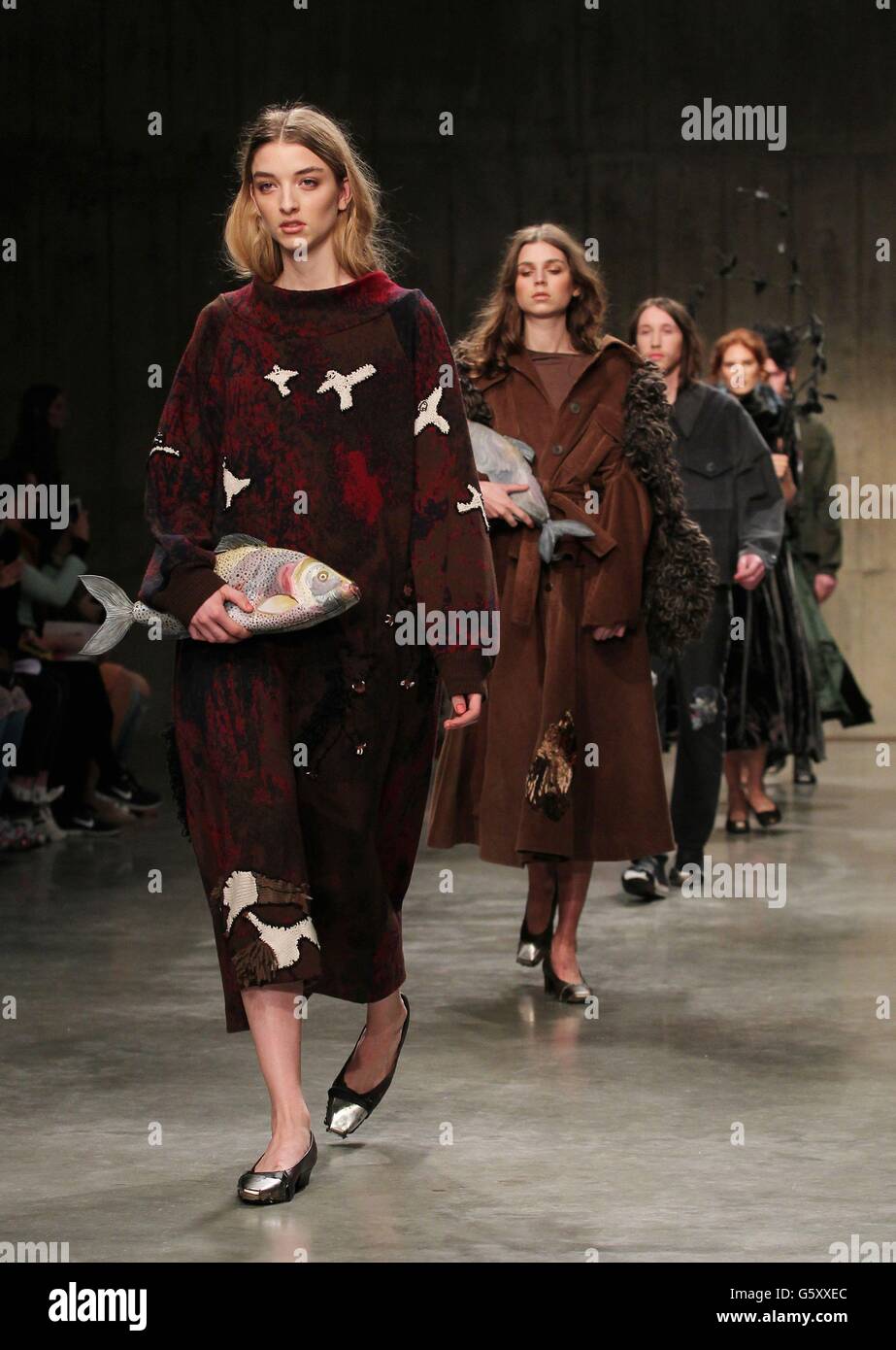 Models on the catwalk wear the Claire Barrow Autumn/Winter 2013 ...