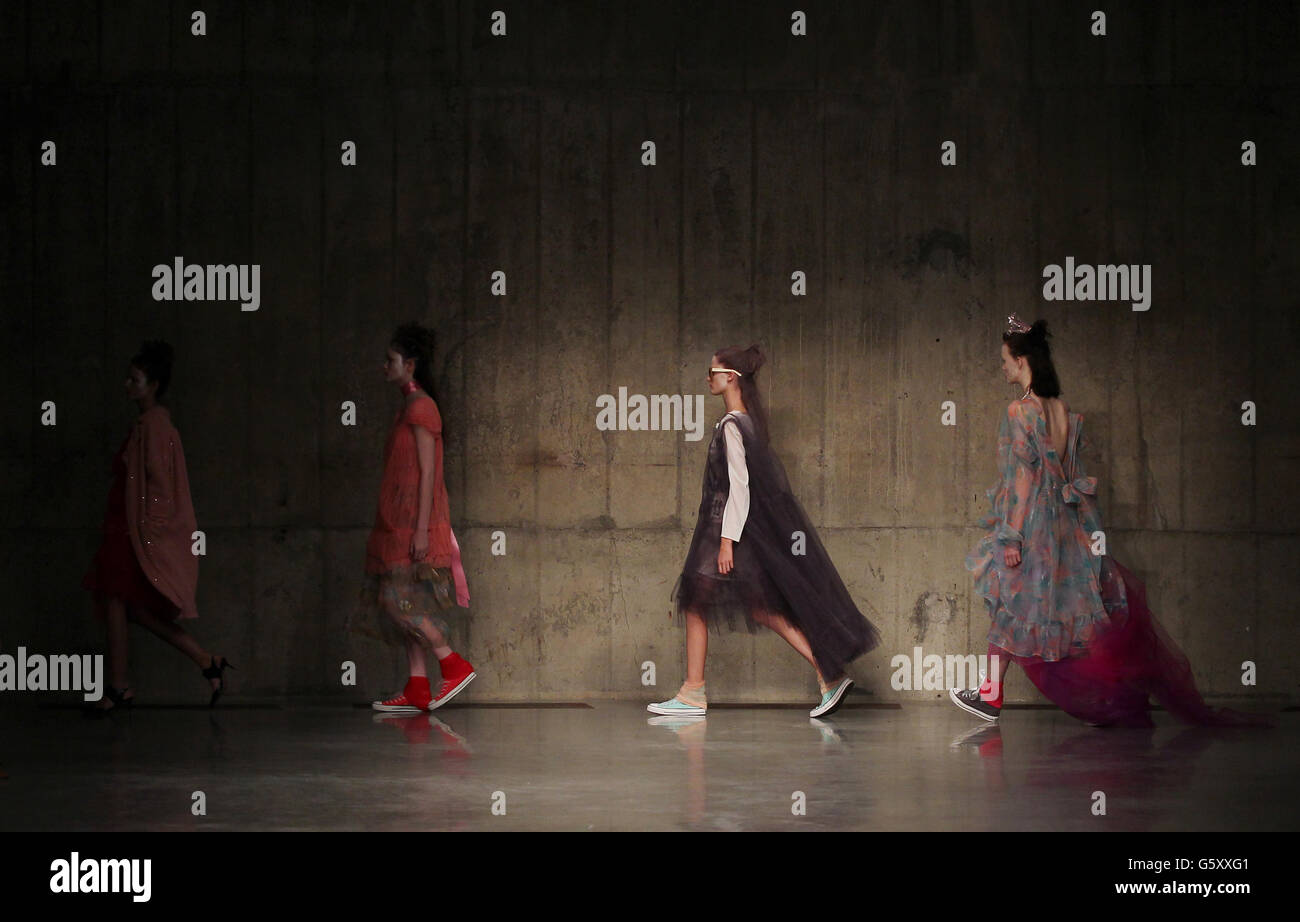 Models on the catwalk wear the Claire Barrow Autumn/Winter 2013 ...