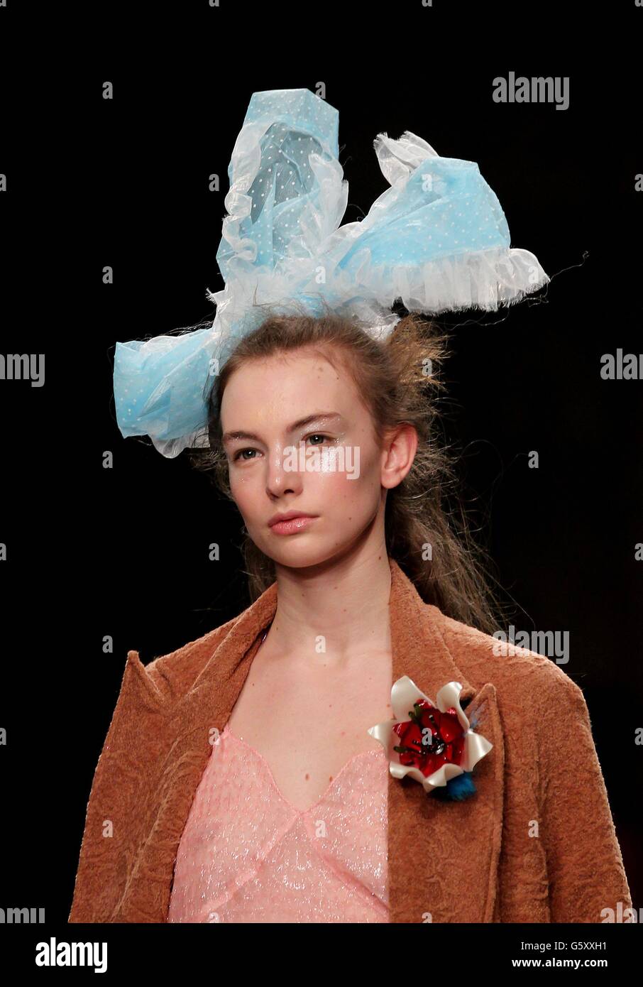 Models on the catwalk wear the Claire Barrow Autumn/Winter 2013 ...