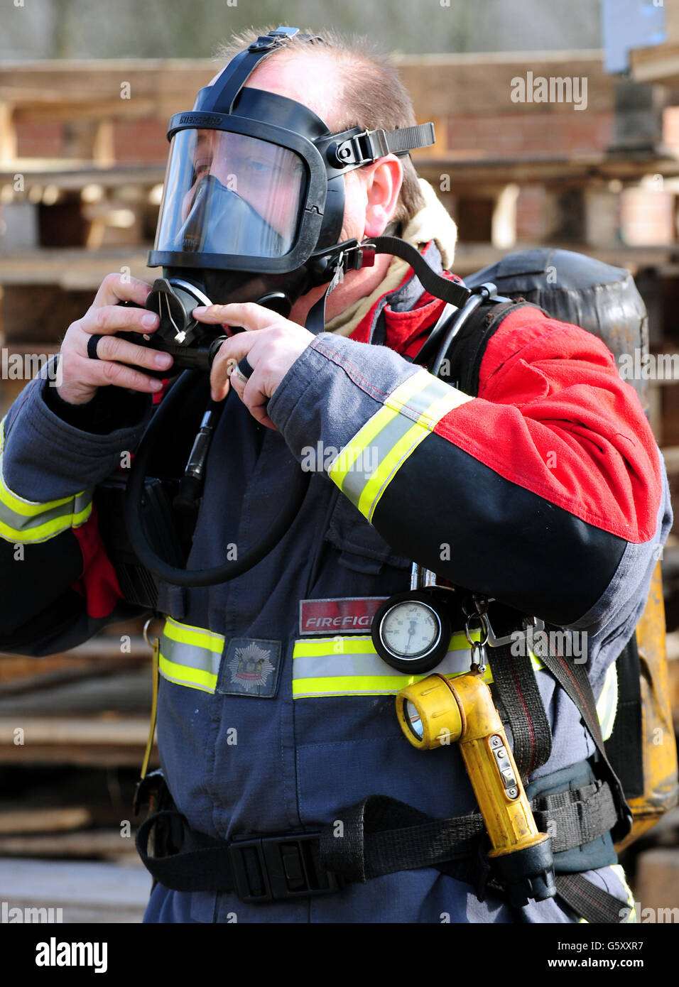 Firefighter breathing apparatus during training hi-res stock ...