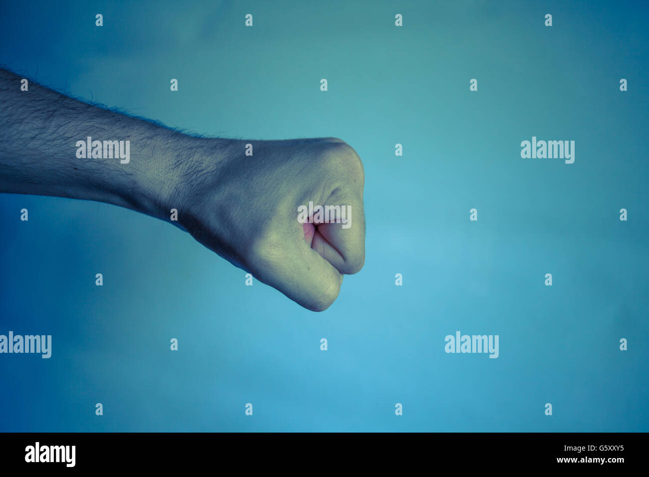 Human hand on vintage background to express strength Stock Photo - Alamy