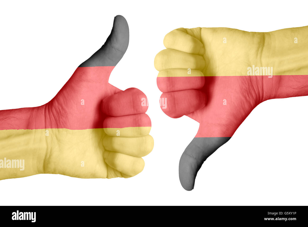 German flag on human thumb up and down male hands Stock Photo - Alamy