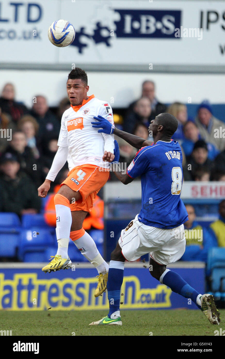 Ipswich Town's Guirane N'Daw and Blackpool Reece Wabara (left) in ...