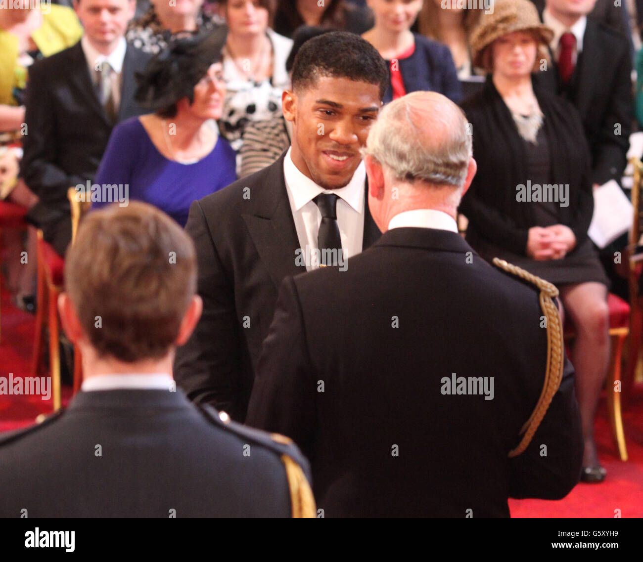 Olympic boxer Anthony Joshua receiving his Member of the British Empire ...