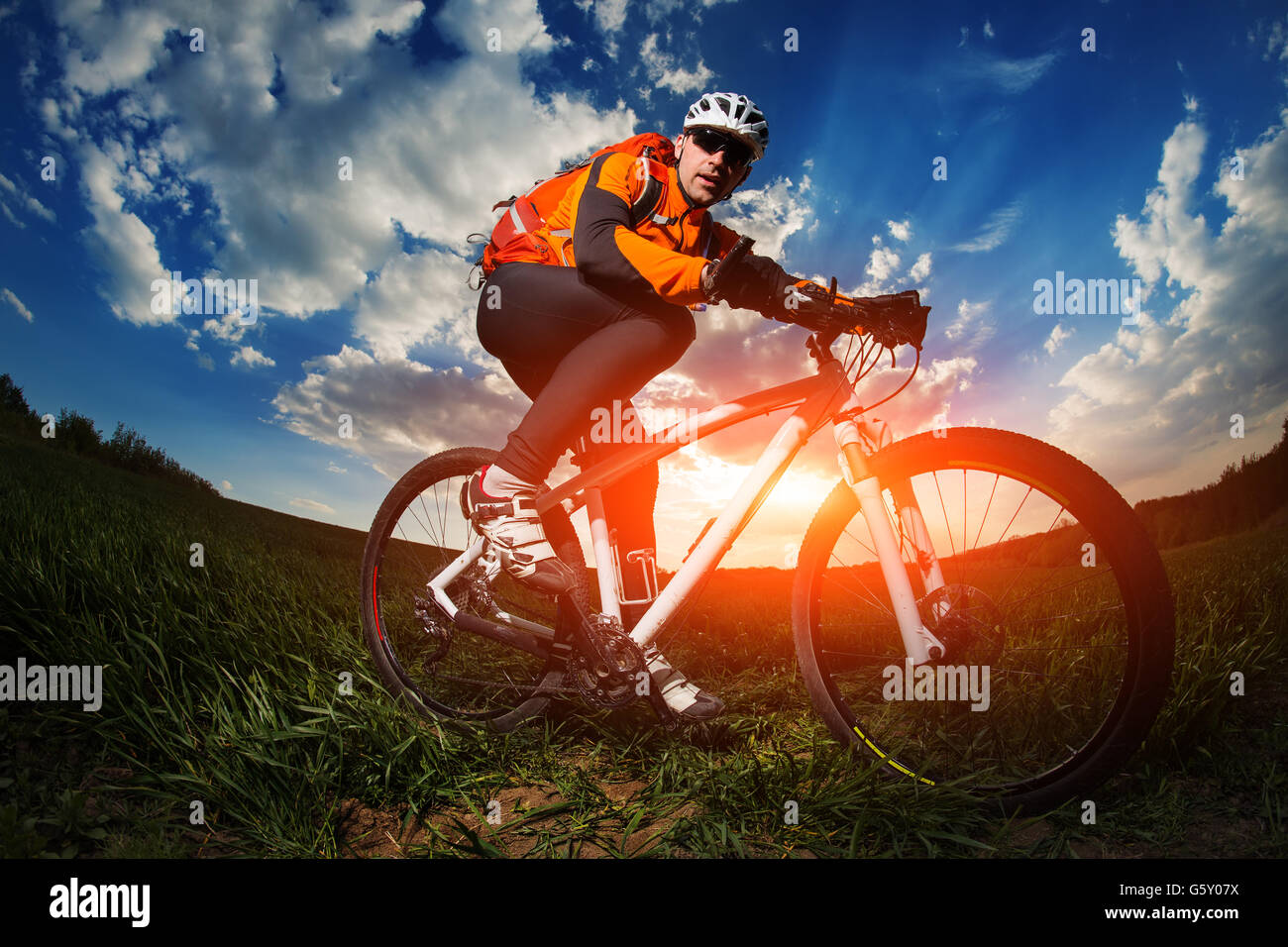 cyclist riding bike on a nature trail in the mountains Stock Photo - Alamy