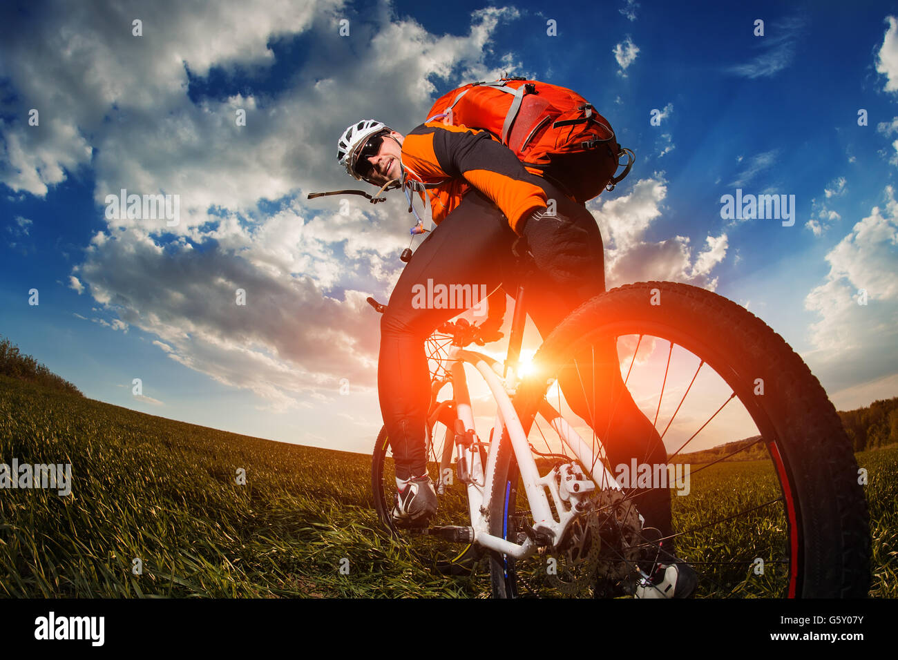 cyclist riding bike on a nature trail in the mountains Stock Photo - Alamy