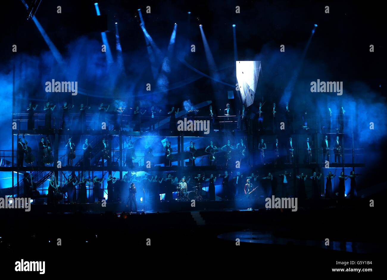 Muse perform during the 2013 Brit Awards at the O2 Arena, London Stock ...
