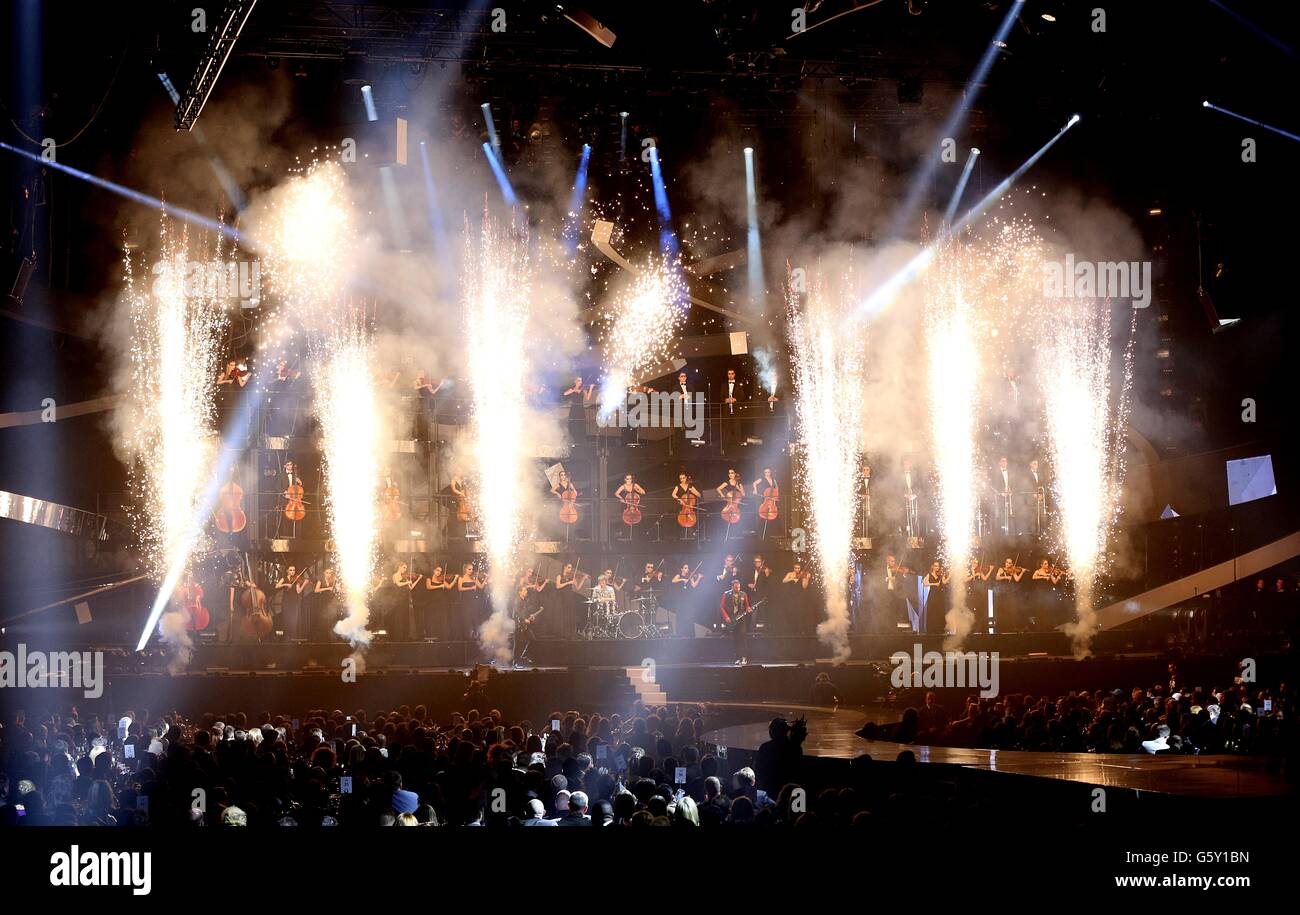 Muse perform during the 2013 Brit Awards at the O2 Arena, London Stock ...