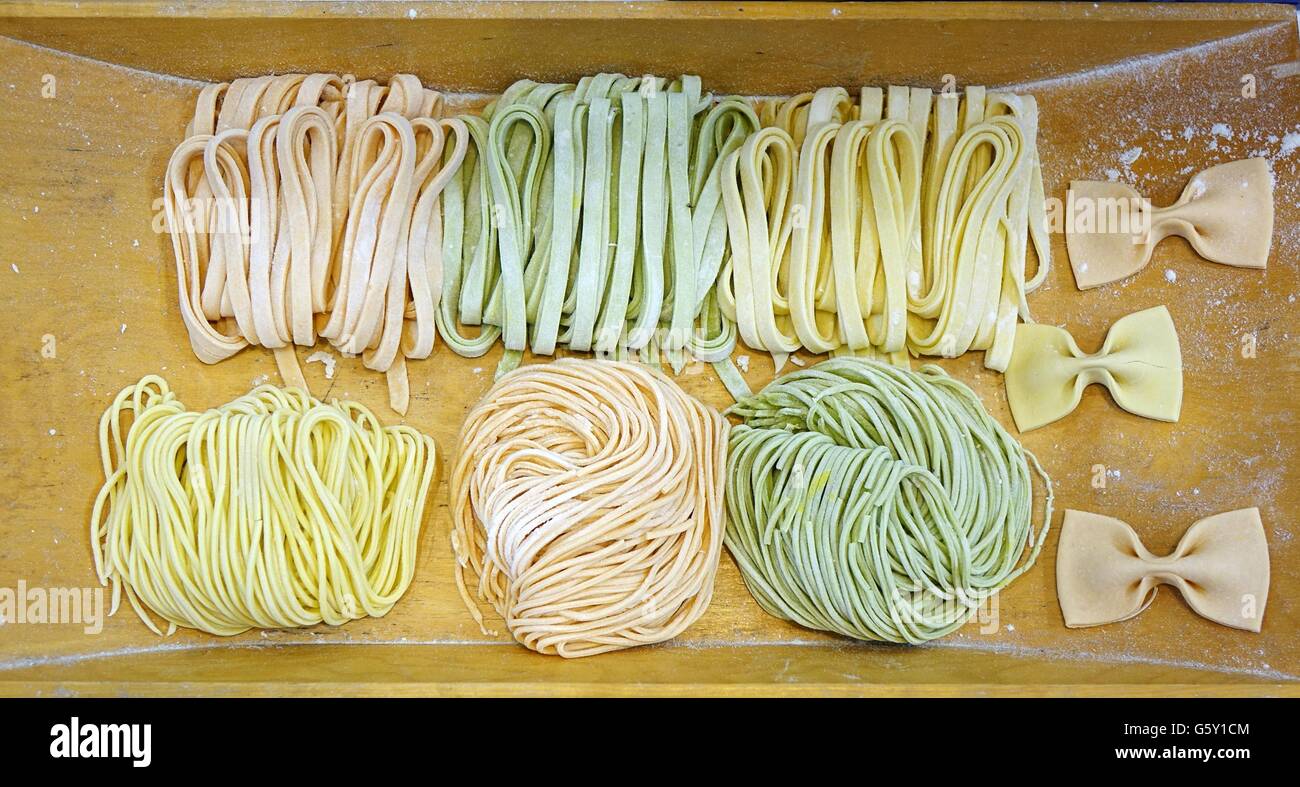 A plate with freshly made pasta in various shapes and colors Stock ...