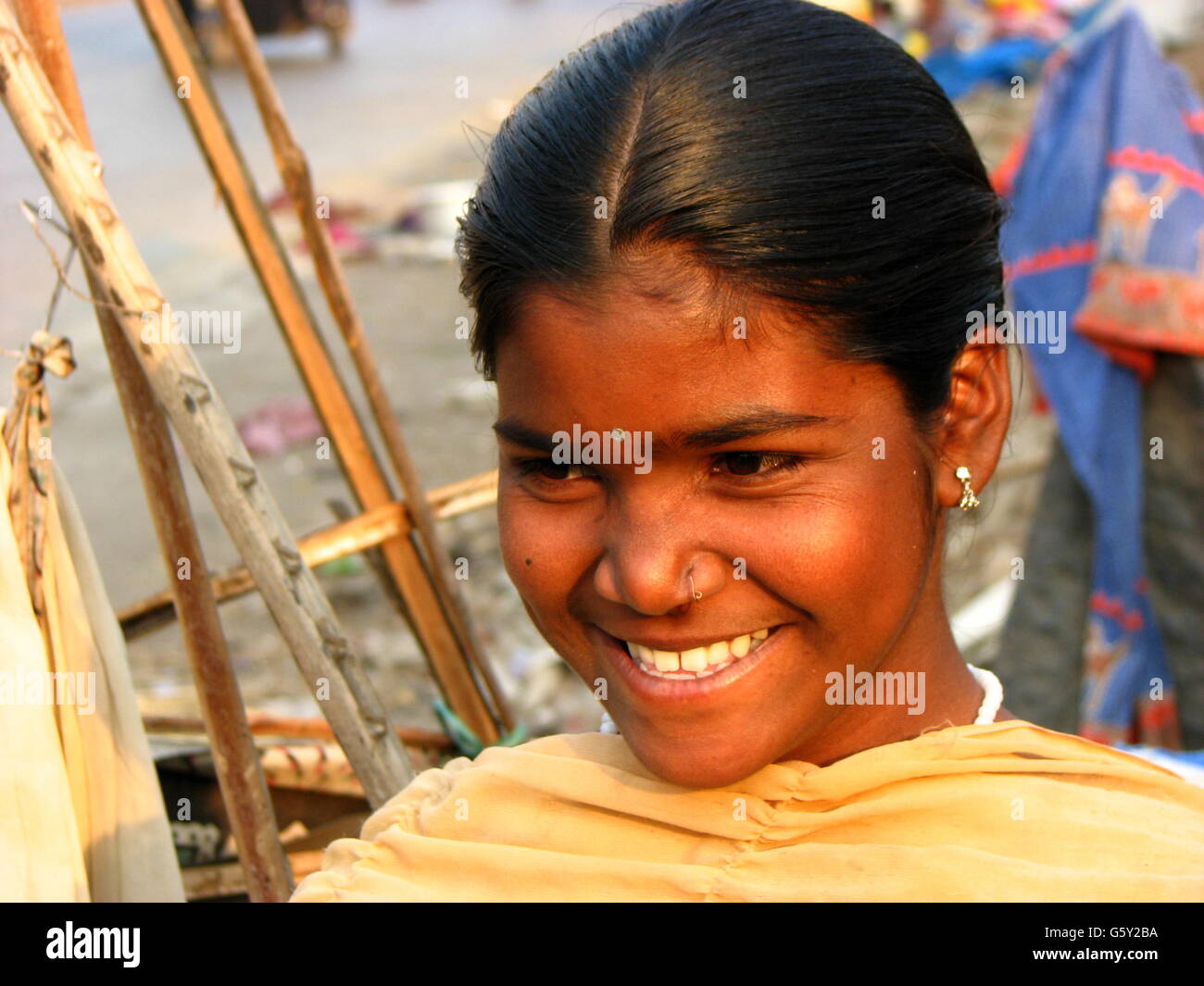A cute poor Indian girl smiling Stock Photo - Alamy
