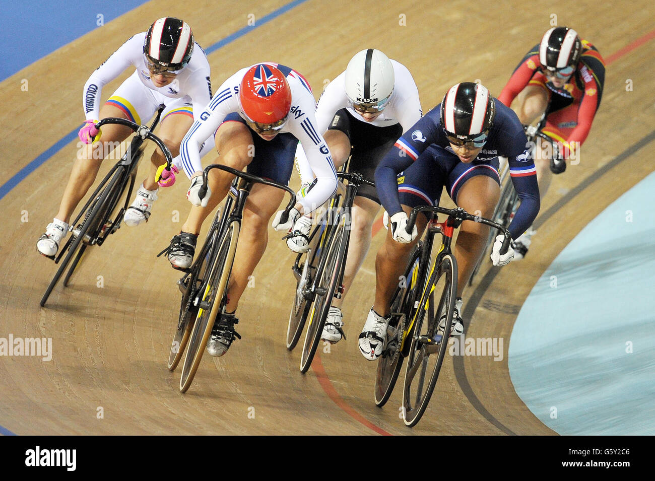 Great Britain's Becky James rides to win her round two keirin race ...