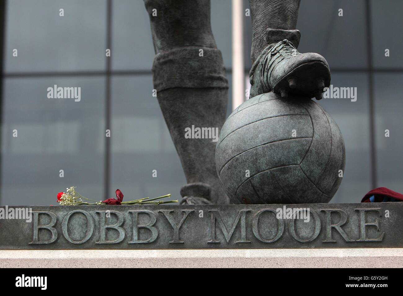 A floral tribute to Bobby Moore is seen on his statue outside Wembley ...