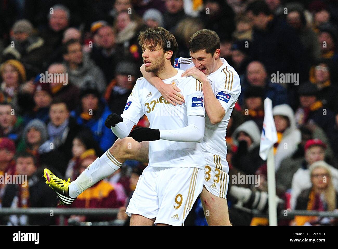 Swansea City's Miguel Michu (left) celebrates scoring their second goal ...