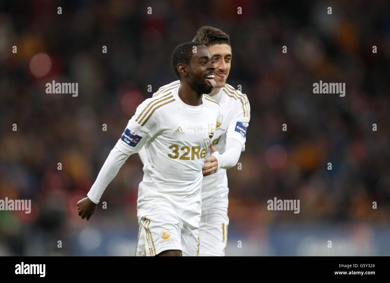 Swansea City's Nathan Dyer celebrates scoring their third goal of the ...
