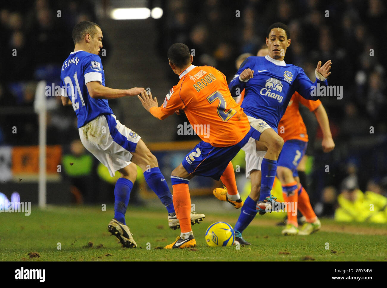 Everton's Leon Osman (left) and Steven Pienaar (right) battle for the ...